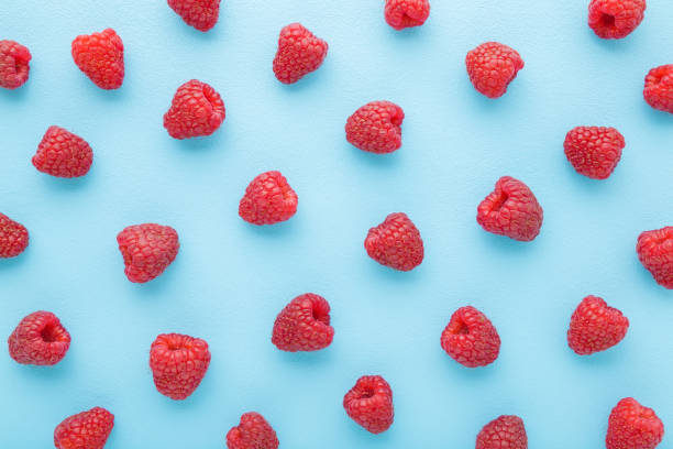 Free Stock Photo of Group of Raspberries on Blue Surface | Download ...