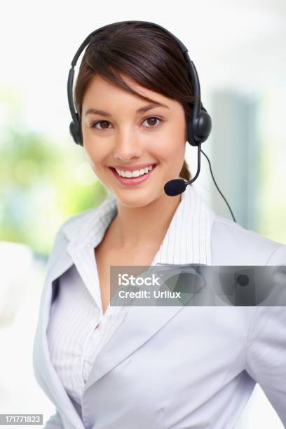 Cute Young Female Call Centre Employee Smiling Stock Photo - Download ... Cute Young Female Call Centre Employee Smiling Stock Photo - Download ...