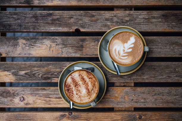 Free Stock Photo of Cup of coffee with latte art on wooden table ...
