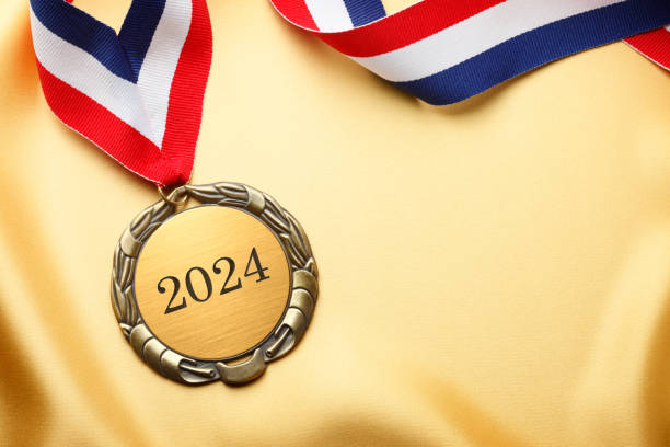 Free picture: A close-up of a gold medal in hand, a prize for winning ...