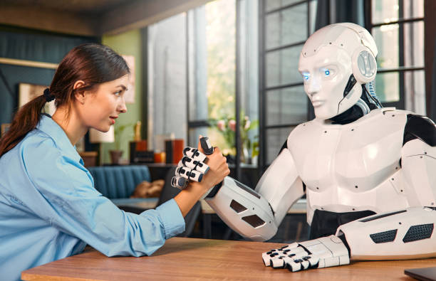 Free Stock Photo of White Robot Holding a Laptop Computer | Download ...