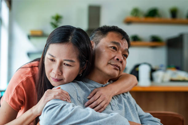 Free Stock Photo of Older couple embracing and comforting each other at ...