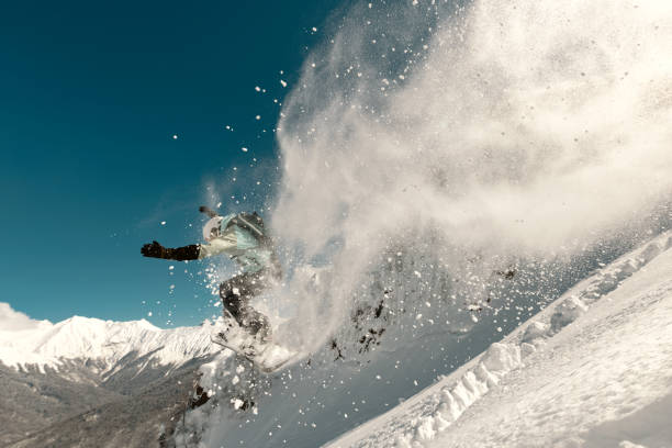 Free Stock Photo of Snowboarder Jumping Off Snowy Mountain | Download ...