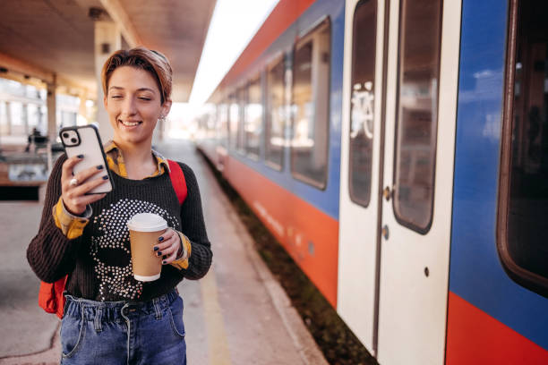 Free Stock Photo of Woman Taking Picture of Train on Train Track ...