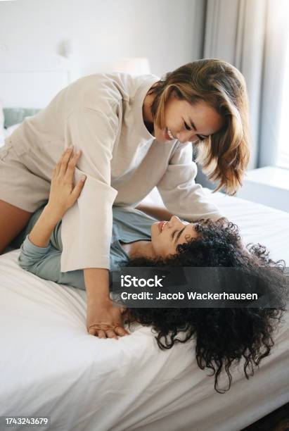 Happy Cuddle And A Lesbian Couple In The Bedroom For Love And Bonding