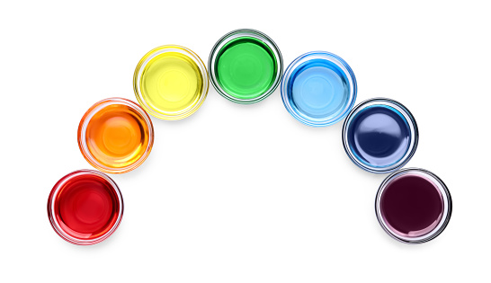 Glass Bowls With Different Food Coloring On White Background Top View