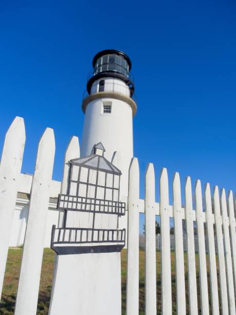 Free Stock Photo of A wooden fence next to a lighthouse | Download Free ...