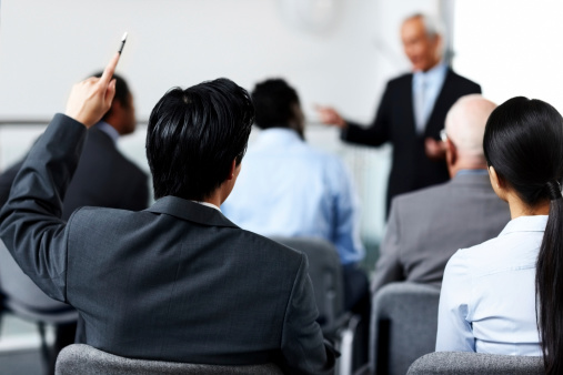 Audience Member Asking Question During A Seminar Stock Photo - Download ... Audience Member Asking Question During A Seminar Stock Photo - Download ...
