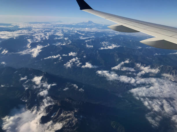 Free Stock Photo of Airplane Wing Flying Over Mountain Range | Download ...