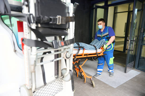 Free Stock Photo of Paramedics pushing patient on gurney in hospital ...