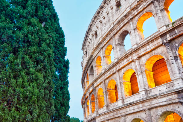 Free Stock Photo of Ancient Colosseum surrounded by lush trees in Rome ...