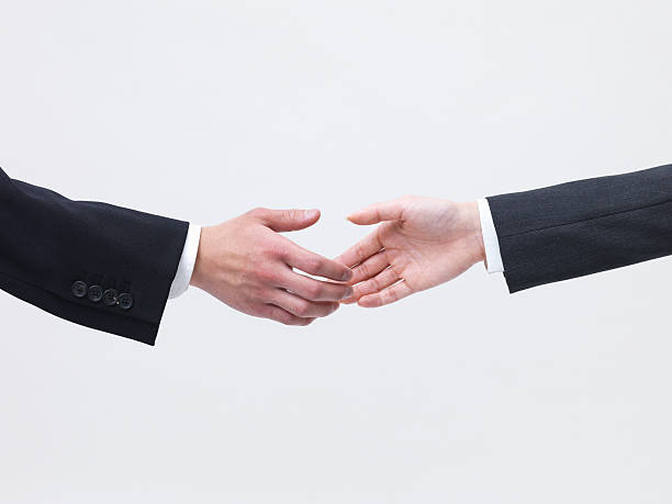 Free Stock Photo of Polite handshake between two business people ...