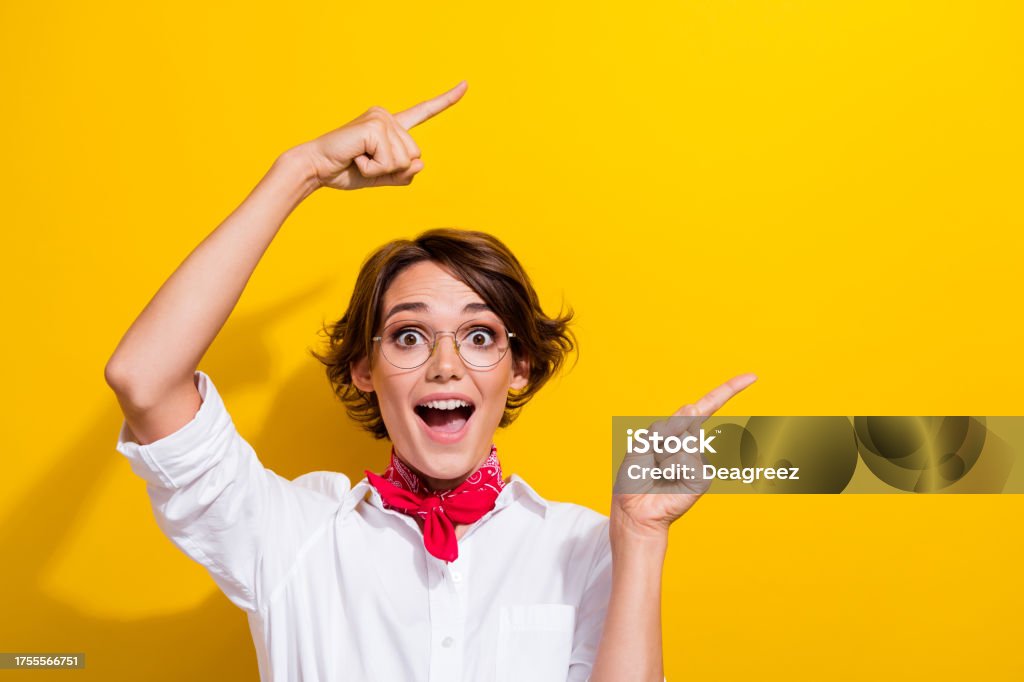 Portrait Of Astonished Cute Girl Open Mouth Direct Fingers Empty Space