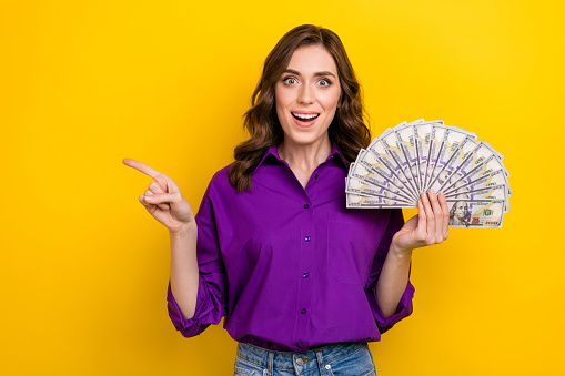Photo Of Impressed Excited Woman With Curly Hairdo Dressed Purple Shirt