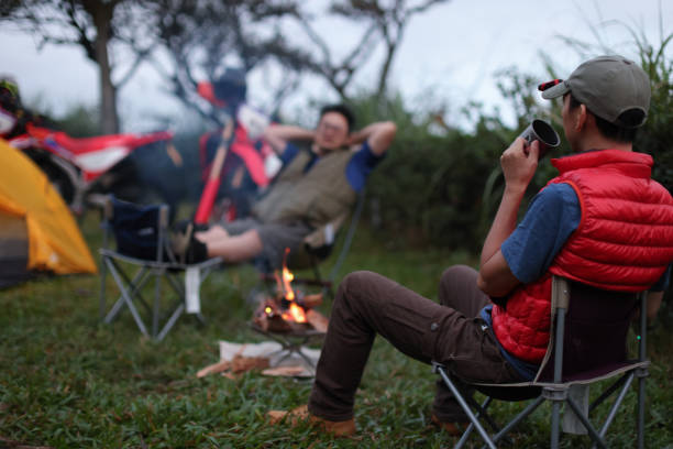 Free Stock Photo of A couple of people sitting on a couch in front of a ...