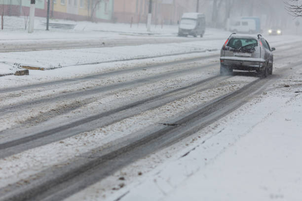 Free Stock Photo of Car Driving Down Snow Covered Road | Download Free ...