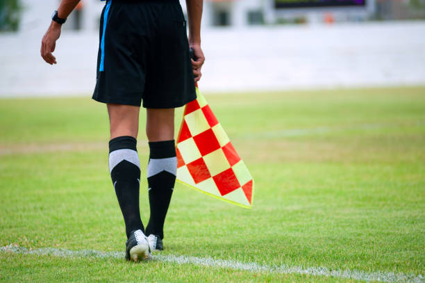 Free Stock Photo of Referee Standing Next to Football Player on Field ...