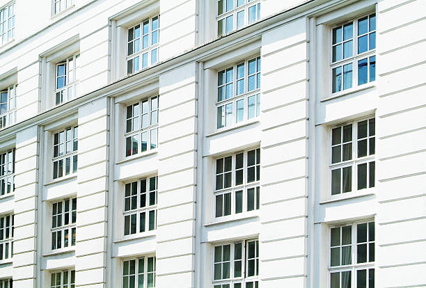 Free Stock Photo of Tall White Building With Lots of Windows | Download ...