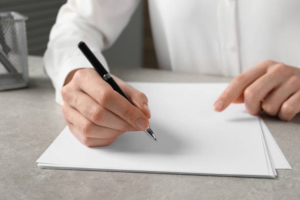 Free Stock Photo of Person Writing With Pen and Paper on Table ...