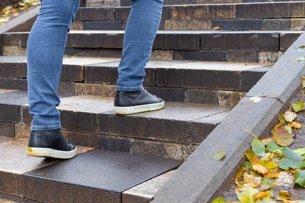 Free Stock Photo of Person Walking Up Stairs With Orange Shoes ...