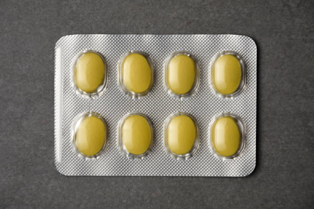 Free Stock Photo of Blister pack of yellow and black capsules ...