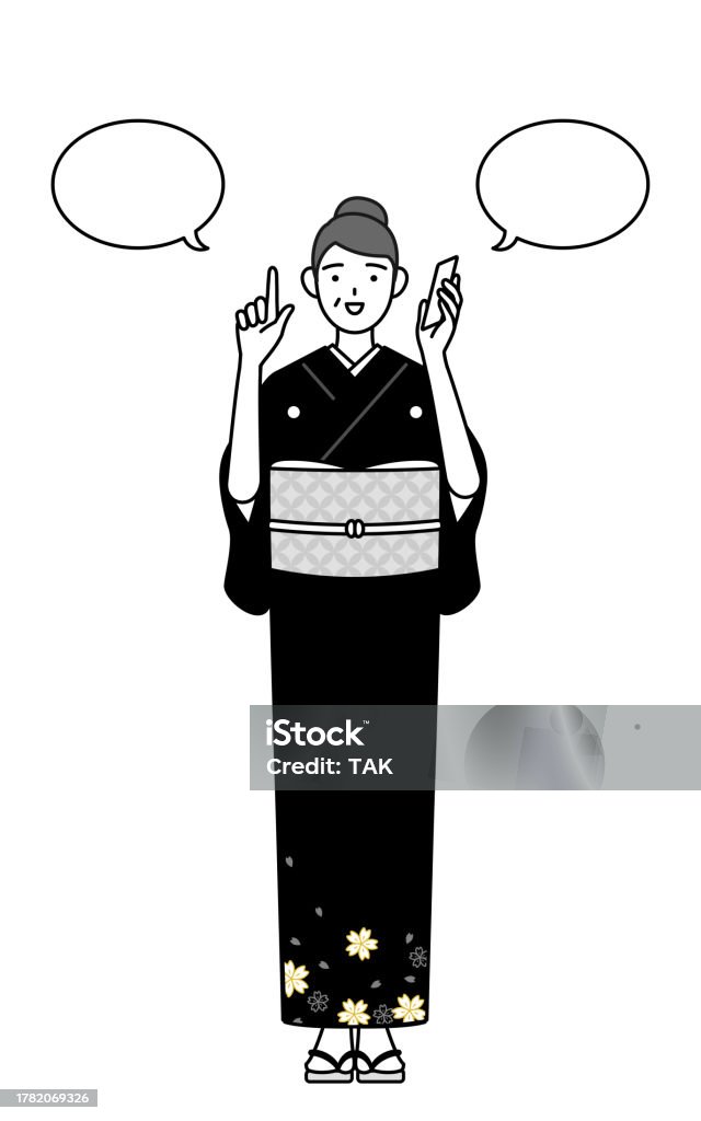 New Years Greeting And Weddings Senior Woman In Kimono Pointing While On The Phone Stock