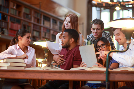 Group Of Young People Studying In Library Stock Photo - Download Image ... Group Of Young People Studying In Library Stock Photo - Download Image ...