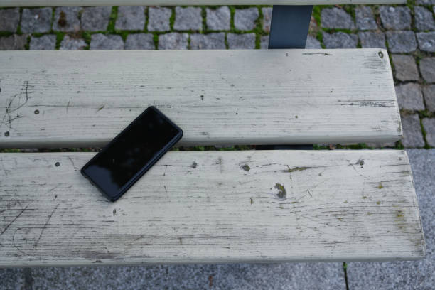 Free Stock Photo of Mobile phone resting at an angle on table ...