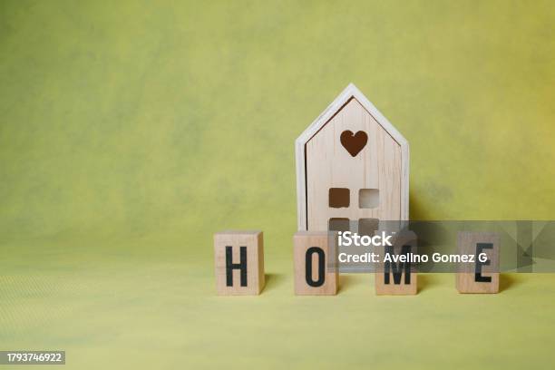 Rumah Kayu Dengan Huruf Kayu Membentuk Kata Home Sebagai Sebuah Konsep ... Rumah Kayu Dengan Huruf Kayu Membentuk Kata Home Sebagai Sebuah Konsep ...