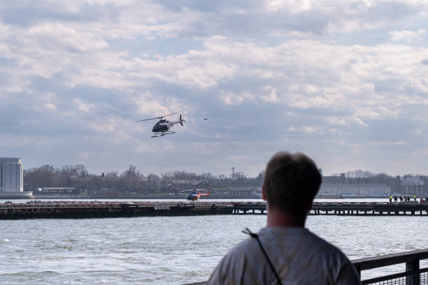 Free Stock Photo of Man Flying Helicopter Over Ocean | Download Free ...