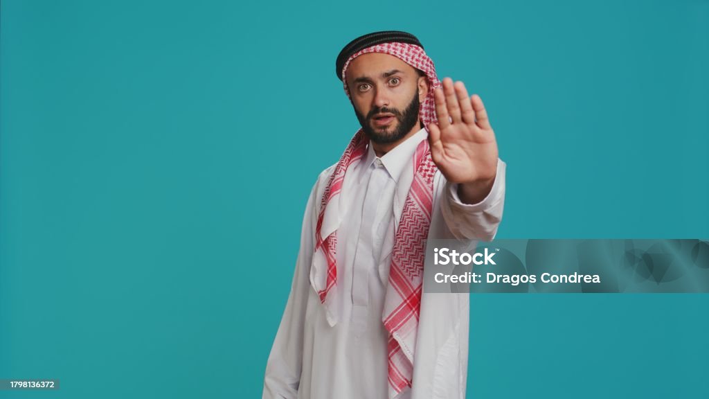 Middle Eastern Person Does Stop Sign Stock Photo - Download Image Now ... Middle Eastern Person Does Stop Sign Stock Photo - Download Image Now ...