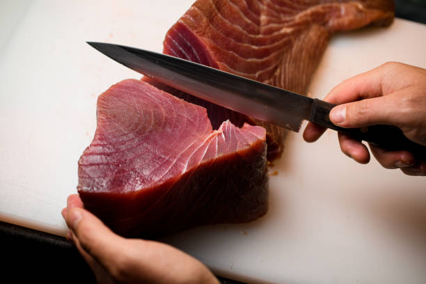 Free Stock Photo of Cropped Image Of Butcher Cutting Tuna | Download ...