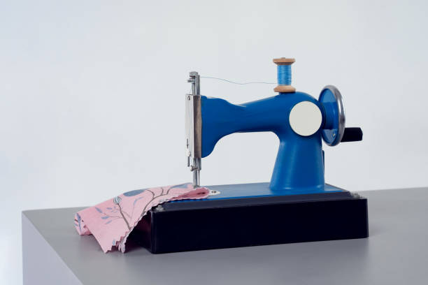 Free Stock Photo of Sewing machine setup with fabric and iron ...