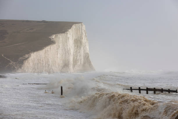 Free Stock Photo of Stormy sea waves crashing on cliffside beach ...