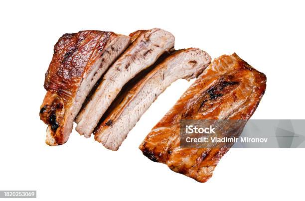 Chopped Bbq Pork Ribs On A Plate With Herbs Isolated White Background