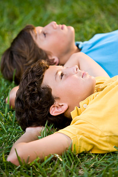 190+ Boys Lying On Grass Daydreaming Stock Photos, Pictures & Royalty ... 190+ Boys Lying On Grass Daydreaming Stock Photos, Pictures & Royalty ...