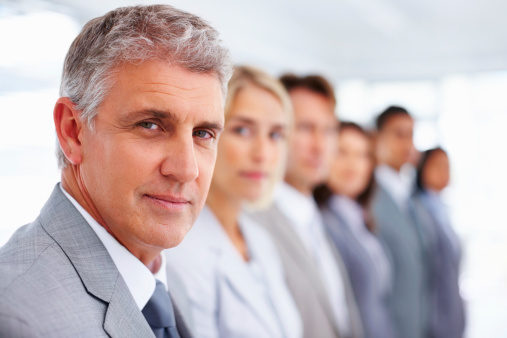 Serious Team Of Executives Lined Up Stock Photo - Download Image Now ... Serious Team Of Executives Lined Up Stock Photo - Download Image Now ...