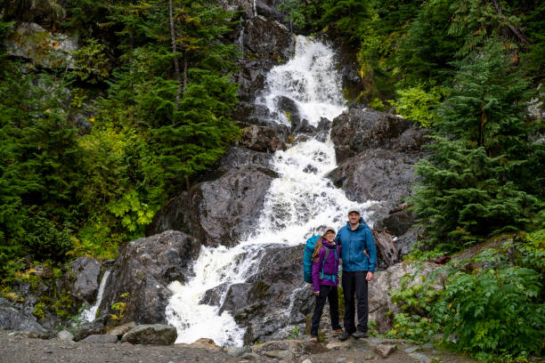 Free Stock Photo of Man Standing in Front of Waterfall | Download Free ...