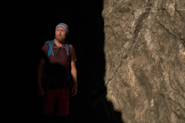Free Stock Photo of Man in Red Jacket Standing in Cave | Download Free ...