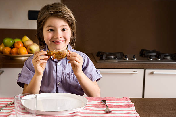 Free Stock Photo of Children eating chicken with their hands and ...