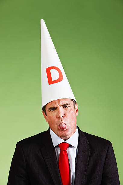 20+ Dumb Man Wearing A Dunce Hat Stock Photos, Pictures & Royalty-Free ... 20+ Dumb Man Wearing A Dunce Hat Stock Photos, Pictures & Royalty-Free ...