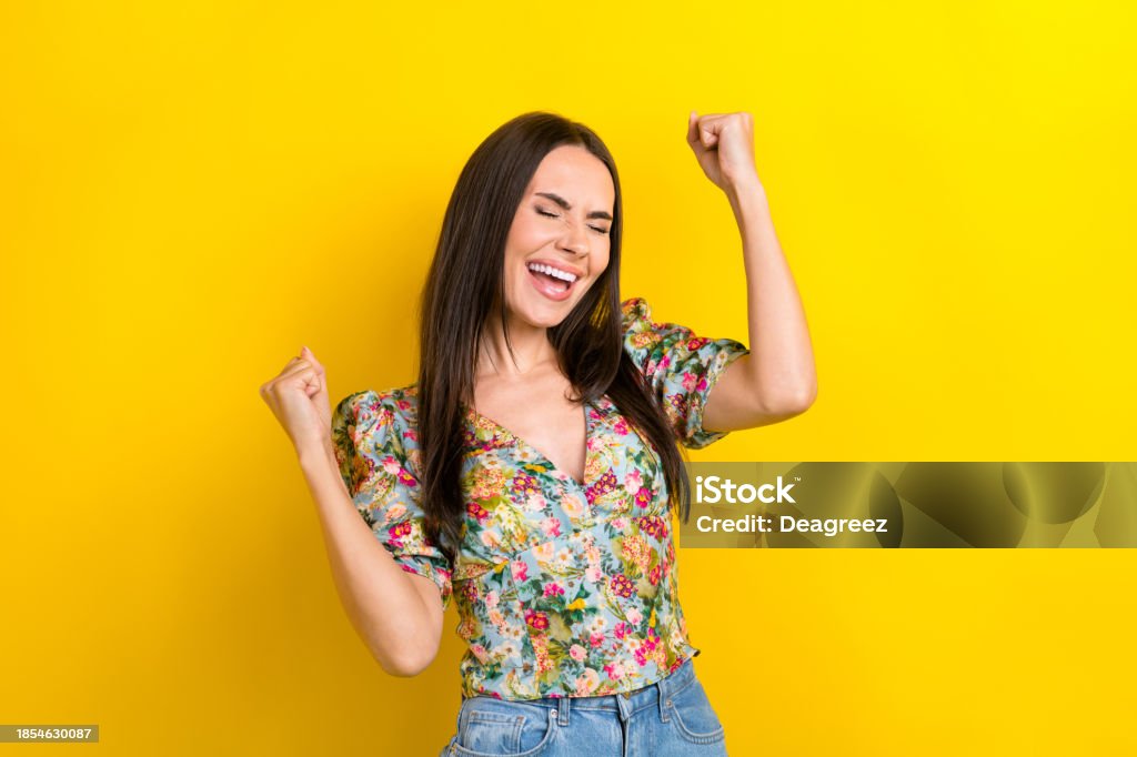 Photo Of Satisfied Adorable Girl With Long Hair Dressed Flower Print