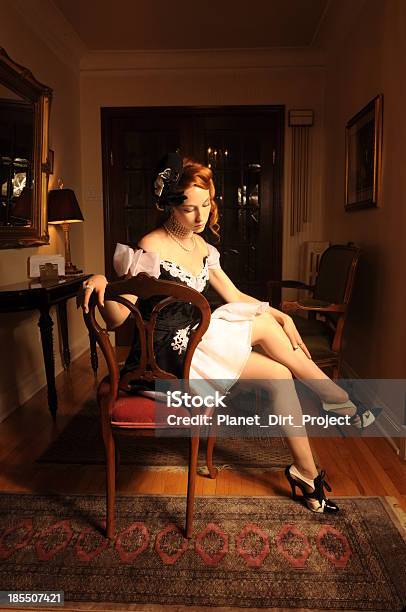 Vintage Victorian Glamour Redhead Lady Sitting In Dress With Hat Stock