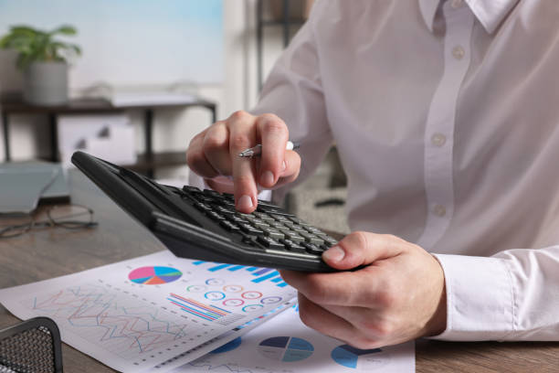 Free Stock Photo of Financial calculator in hand displaying numbers ...