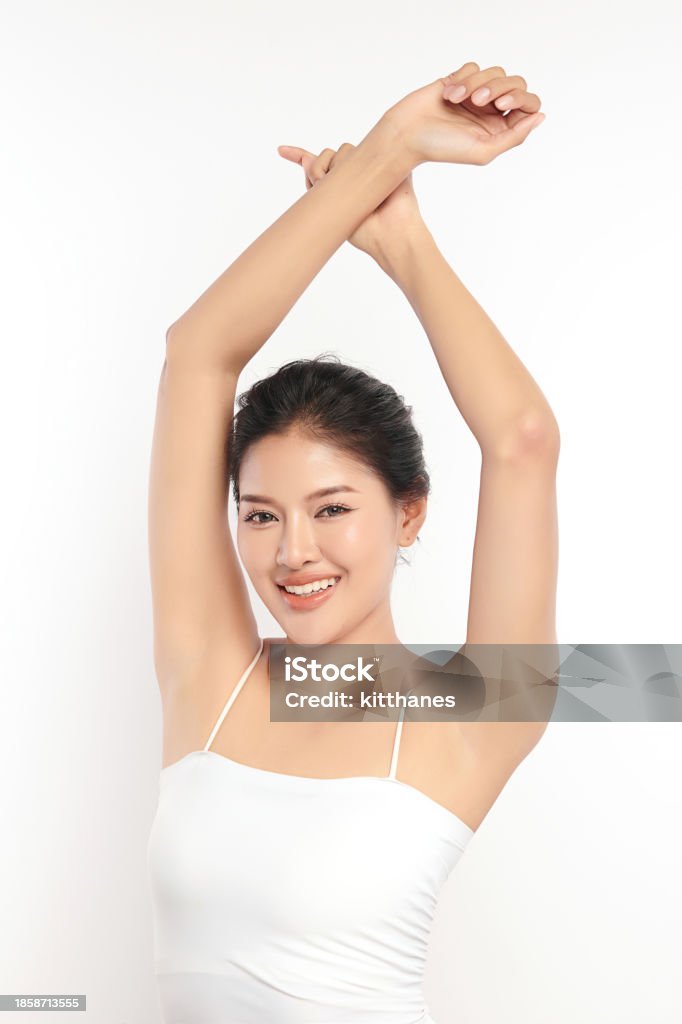 Beautiful Young Asian Woman Lifting Hands Up To Show Off Clean And
