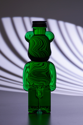 Plastic Teddy Bear Bottle With Food Coloring And Strange Lighting Effects Shapes And Textures