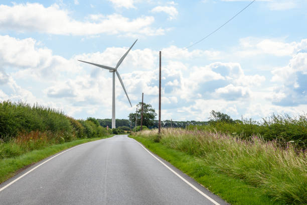 Free Stock Photo of A road with wind turbines in the distance ...