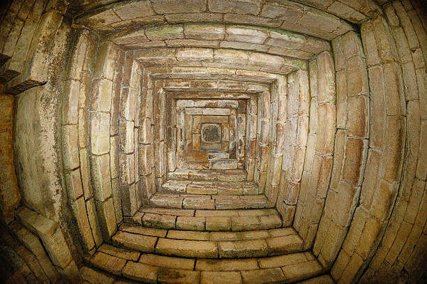 Free picture: A vertical brick tunnel with a square hole in the middle ...