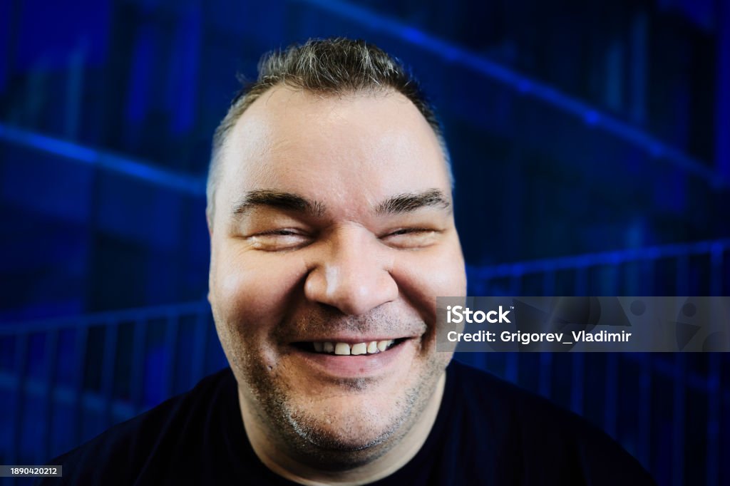 Whitetoothed Smile Of An Overweight European Man 47 Years Old Closeup
