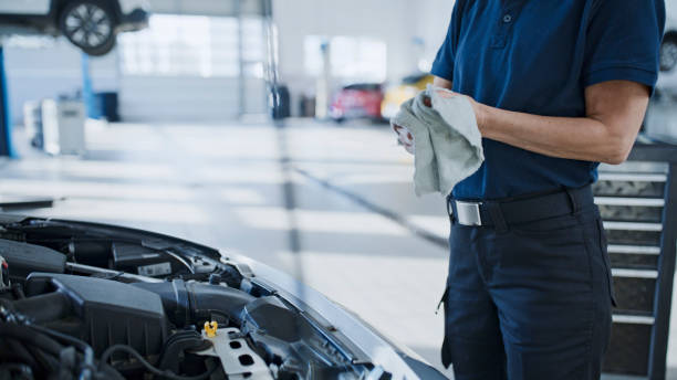 Free Stock Photo of Mechanic cleaning up car parts | Download Free ...